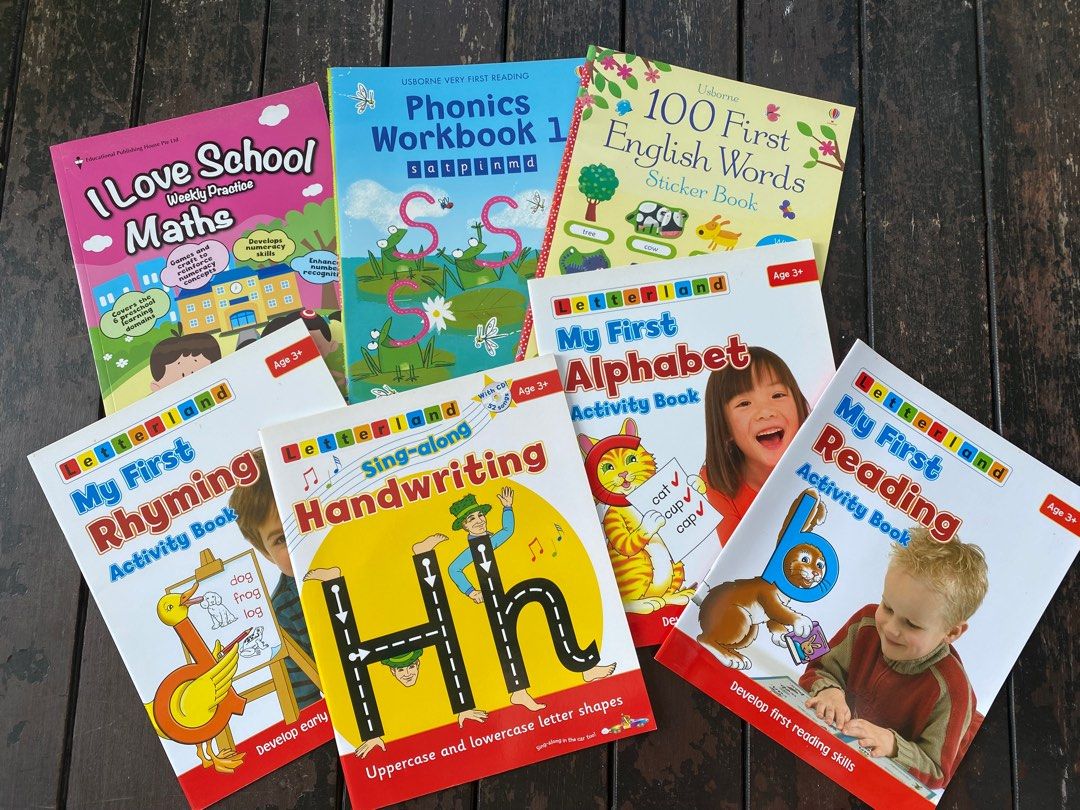 Letterland activity books, usborne sticker book and MOE math weekly ...