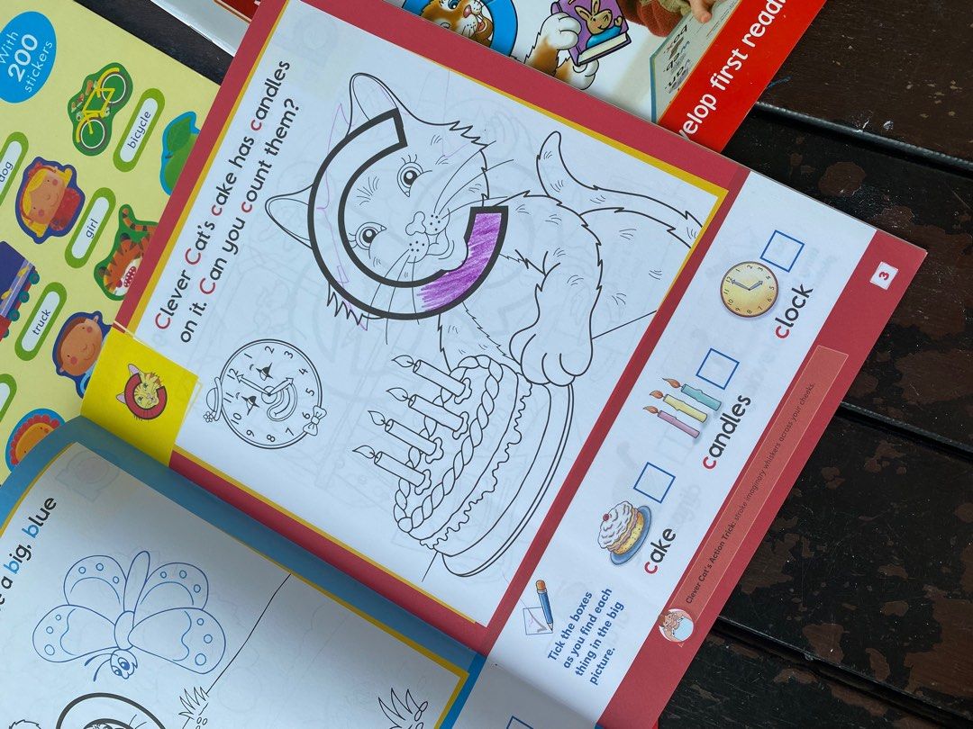 Letterland activity books, usborne sticker book and MOE math weekly ...