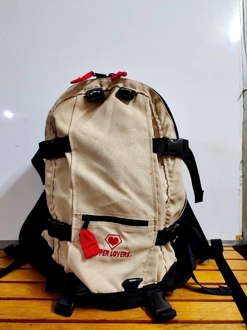 SUPER LOVER BACKPACK (powdeadstock), Men's Fashion, Bags, Backpacks on Carousell