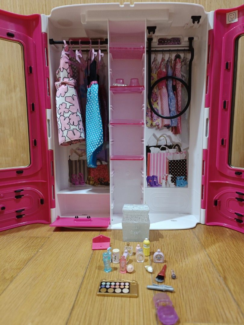 Barbie Wardrobe with clothes, hangers, a necklace and makeup set ...
