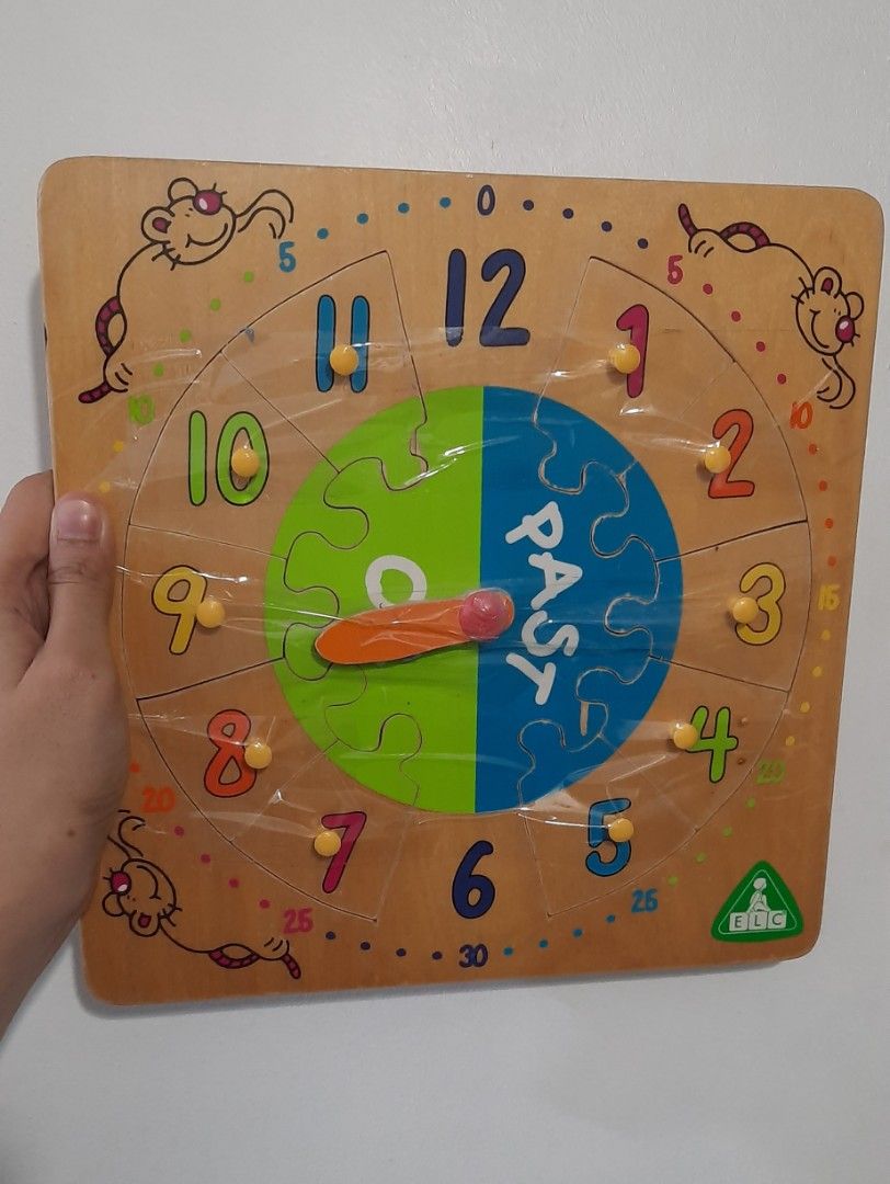 ELC Wooden Clock Puzzle, Hobbies & Toys, Toys & Games on Carousell