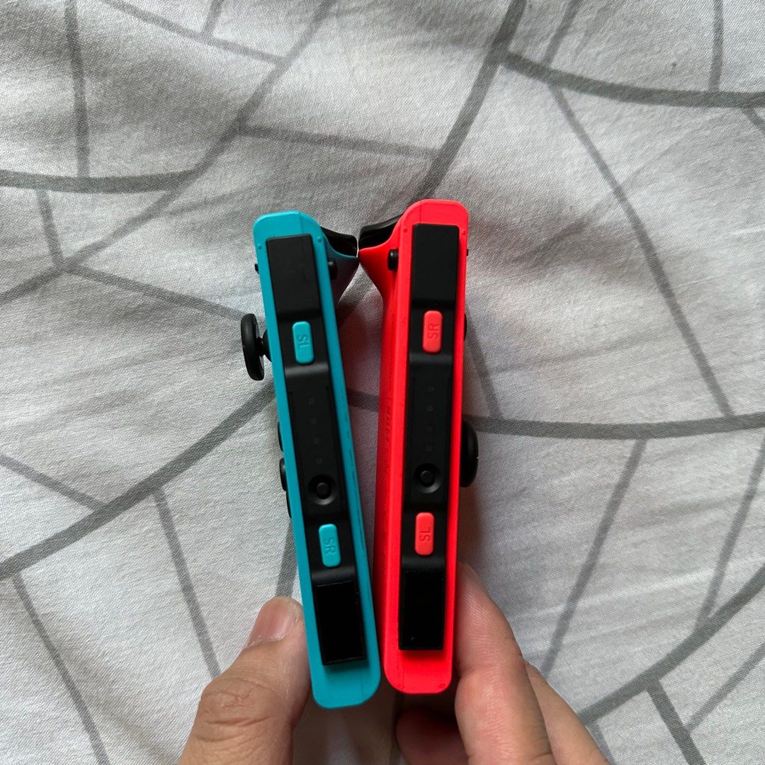 Nintendo Switch Joycons Neon Red / Blue on Carousell