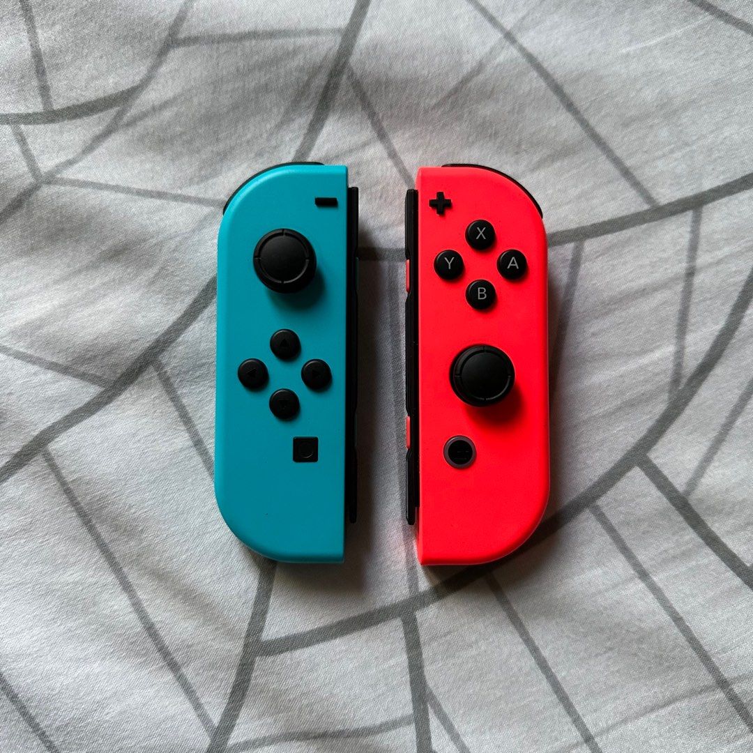 Nintendo Switch Joycons Neon Red / Blue on Carousell