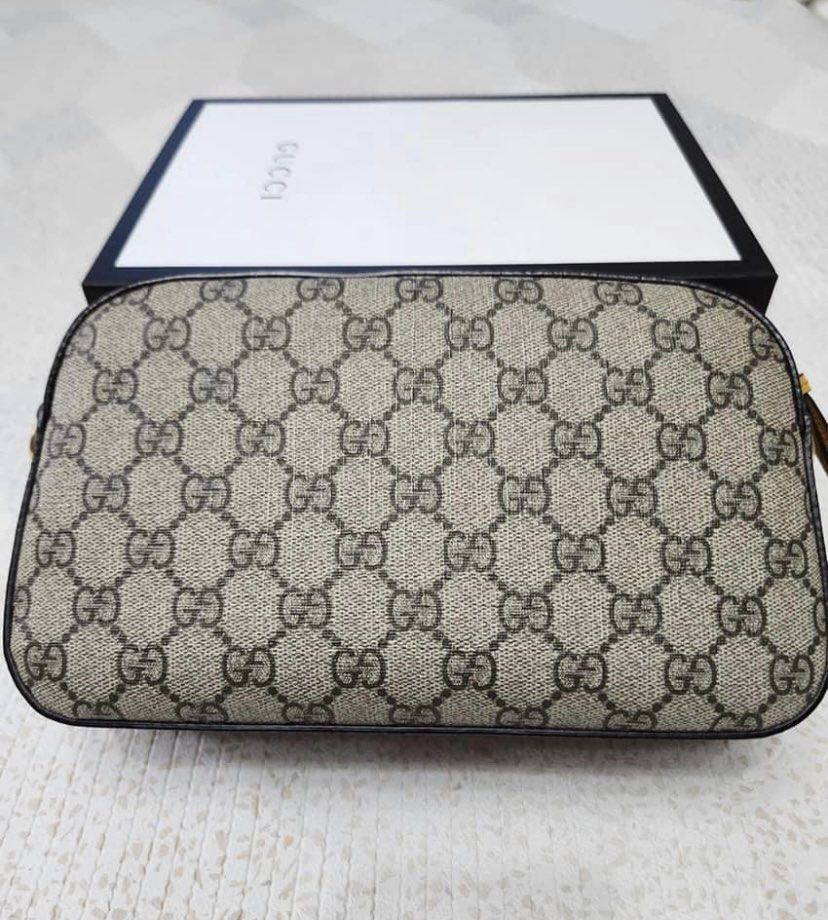 Gucci Supreme camera bag on Carousell