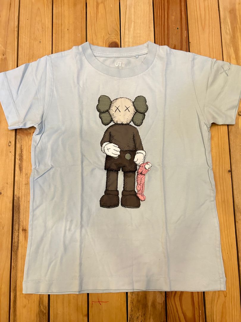 Uniqlo kaws light blue shirt on Carousell
