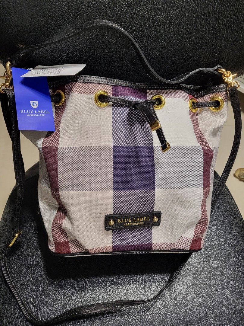 Blue label bracket bag, Luxury, Bags & Wallets on Carousell