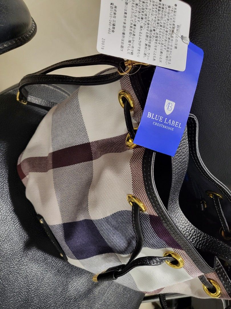 Blue label bracket bag, Luxury, Bags & Wallets on Carousell