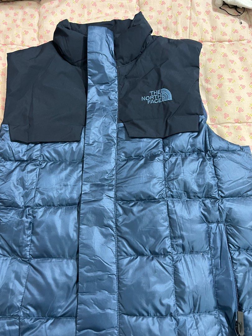 Original TNF the north face vest on Carousell