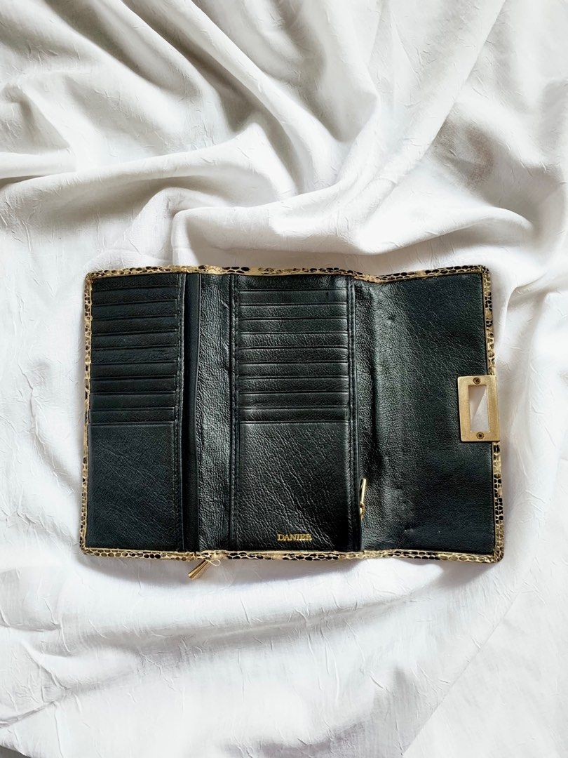 Authentic Danier leather snakeskin wallet, Women's Fashion, Bags ...