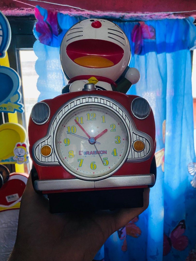 Doraemon in car clock working, Hobbies & Toys, Toys & Games on Carousell