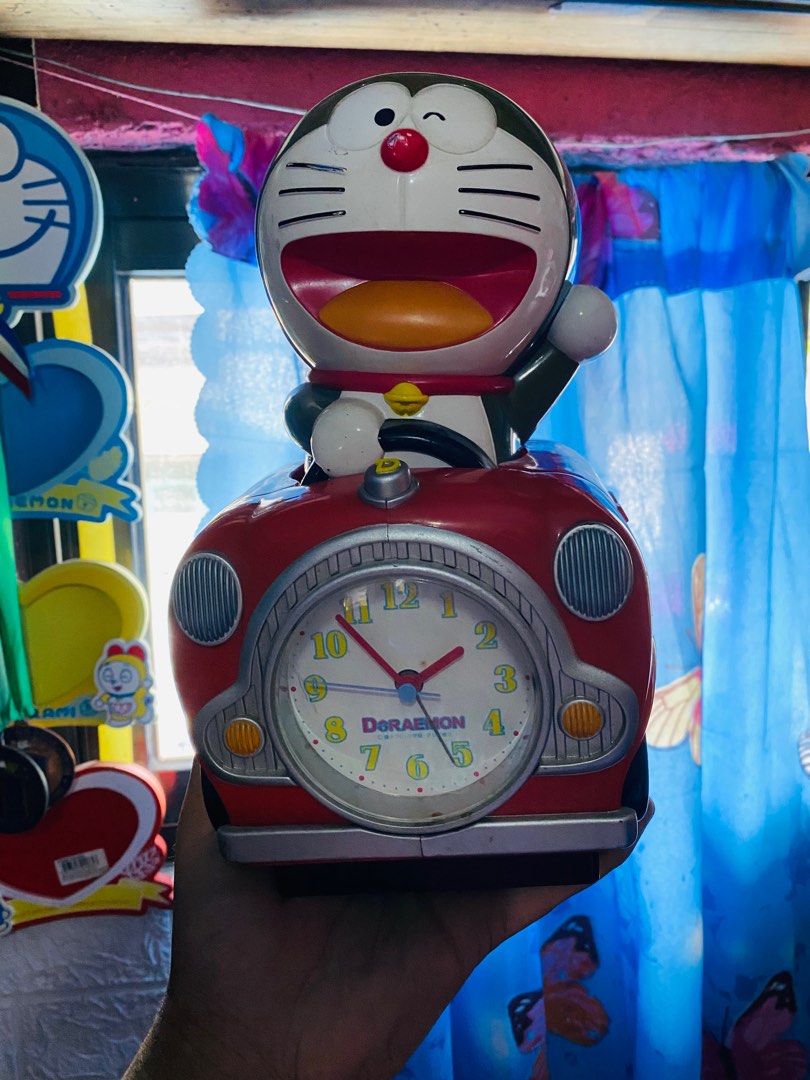 Doraemon in car clock working, Hobbies & Toys, Toys & Games on Carousell