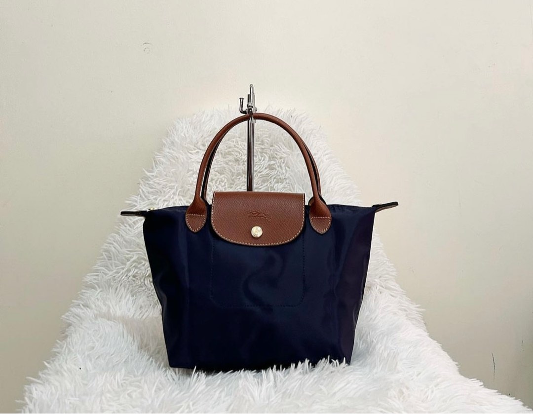 Original longchamp mini in navy blue on Carousell