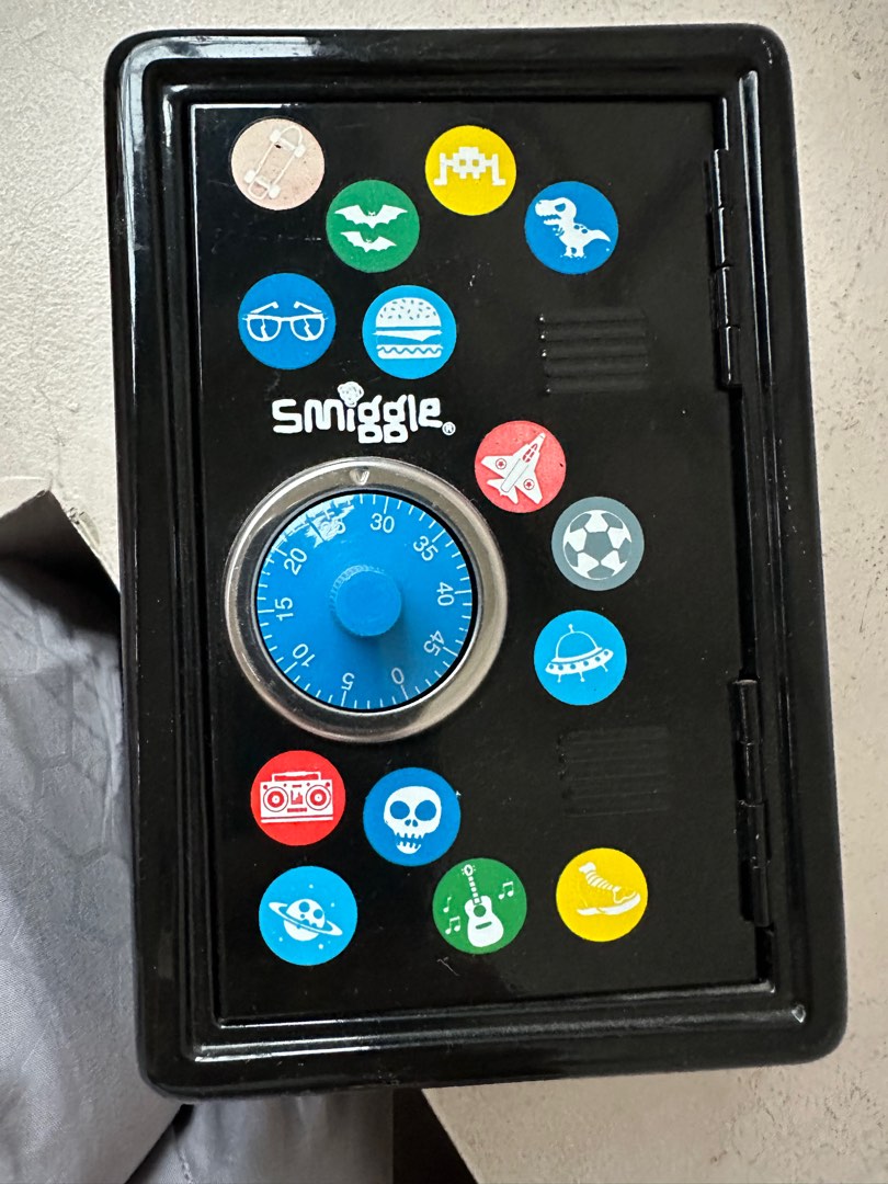 Snuggle money safe with dial, Hobbies & Toys, Toys & Games on Carousell