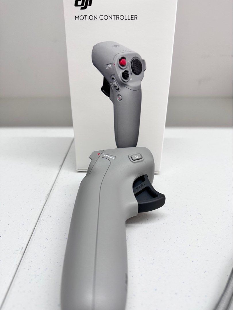 DJI Motion Controller, Photography, Drones on Carousell