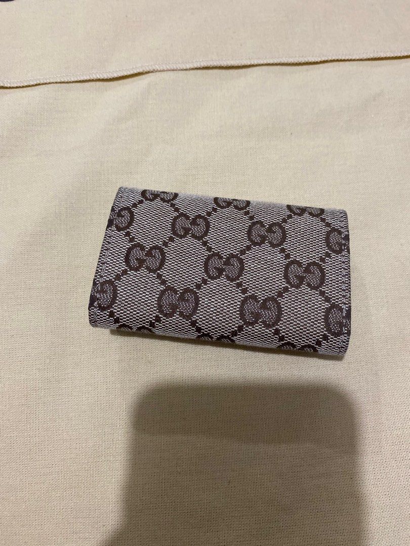 Gucci key holder, Luxury, Bags & Wallets on Carousell