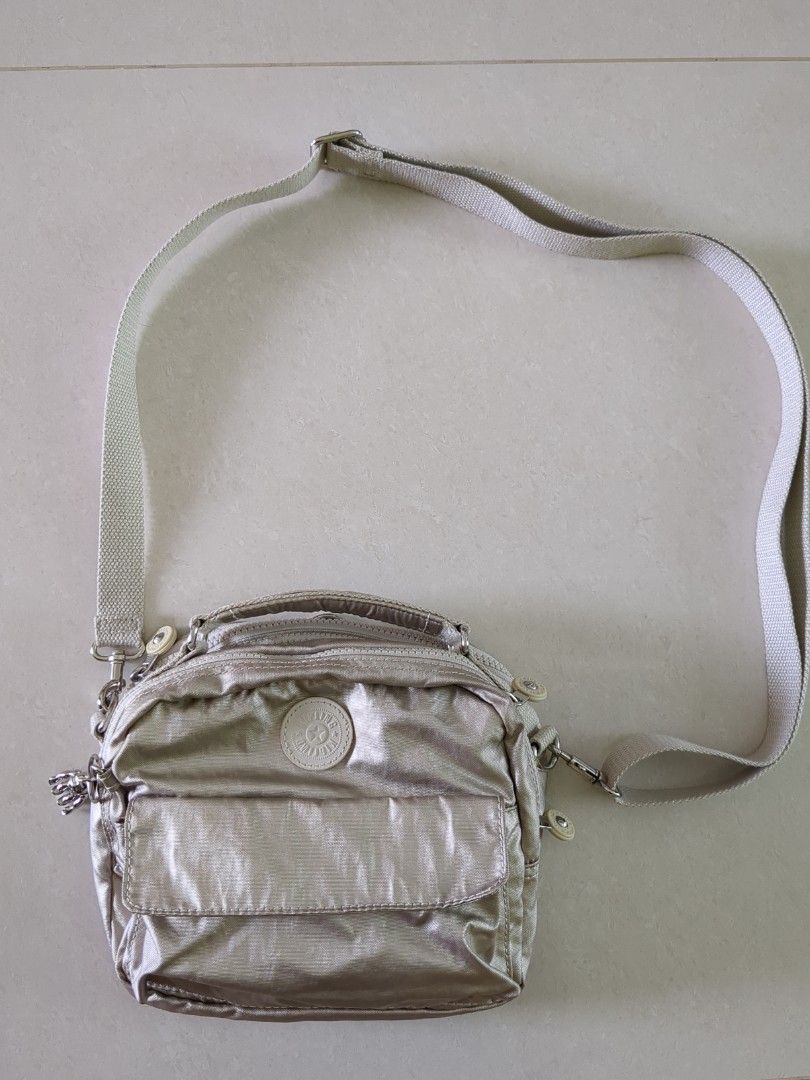 Authentic Kipling silver candy bag, Women's Fashion, Bags & Wallets ...