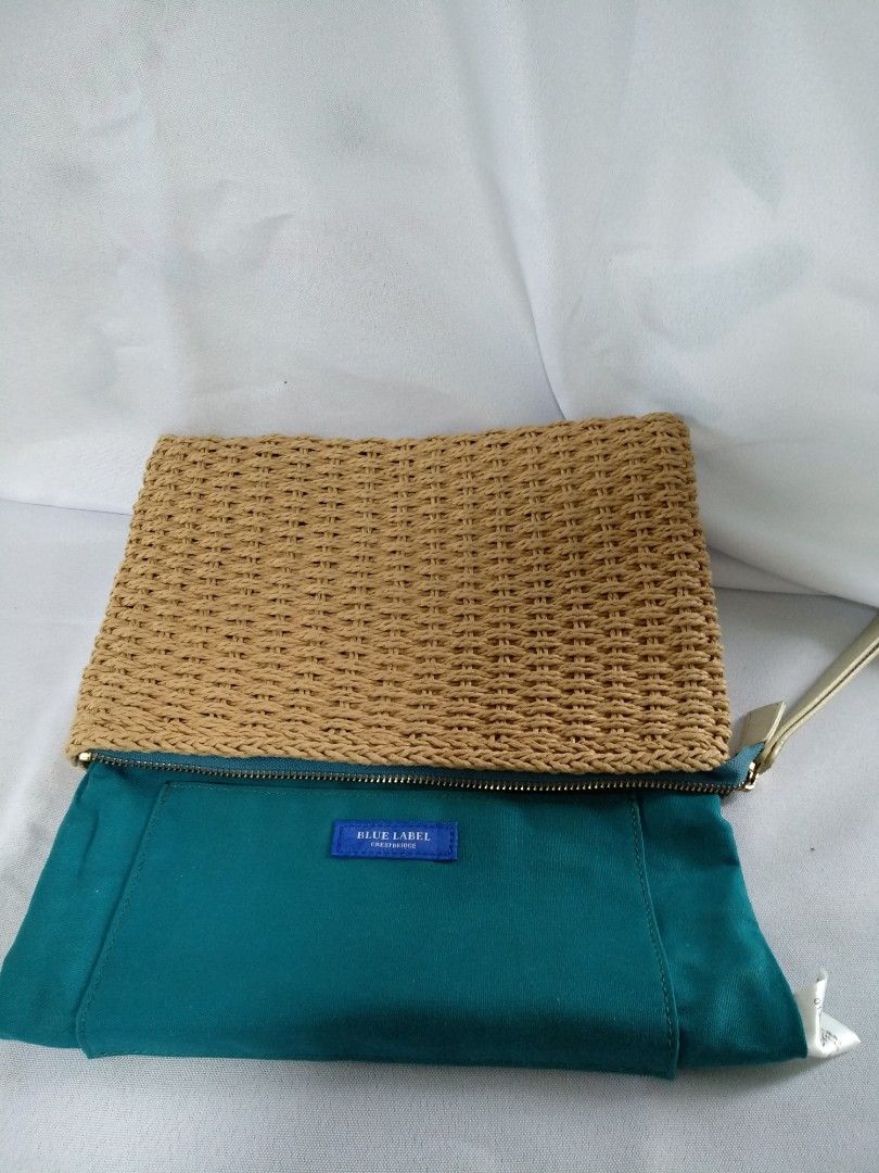 Blue label ribbon straw pouch, Luxury, Bags & Wallets on Carousell