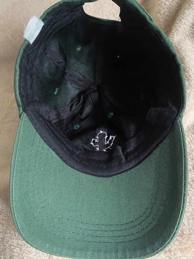 Forest green baseball cap on Carousell