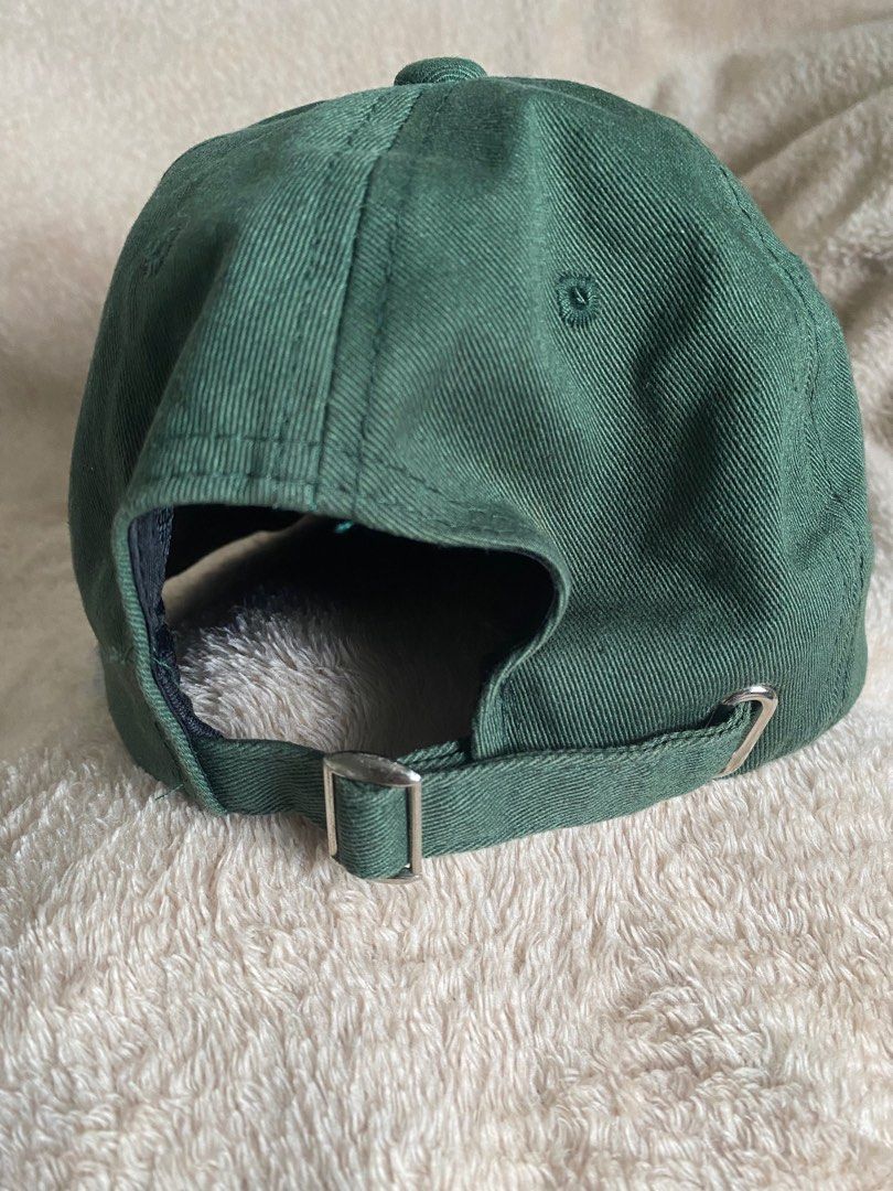Forest green baseball cap on Carousell