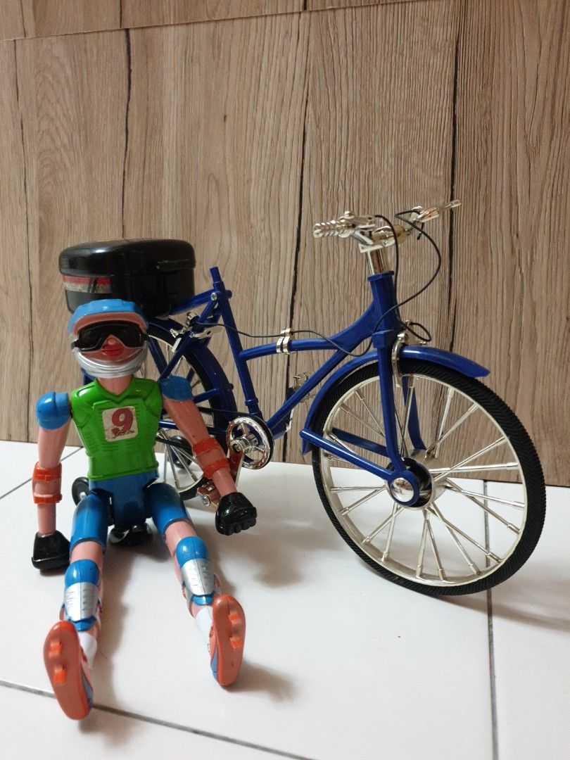 Man with bicycle, Hobbies & Toys, Collectibles & Memorabilia, Vintage Collectibles on Carousell