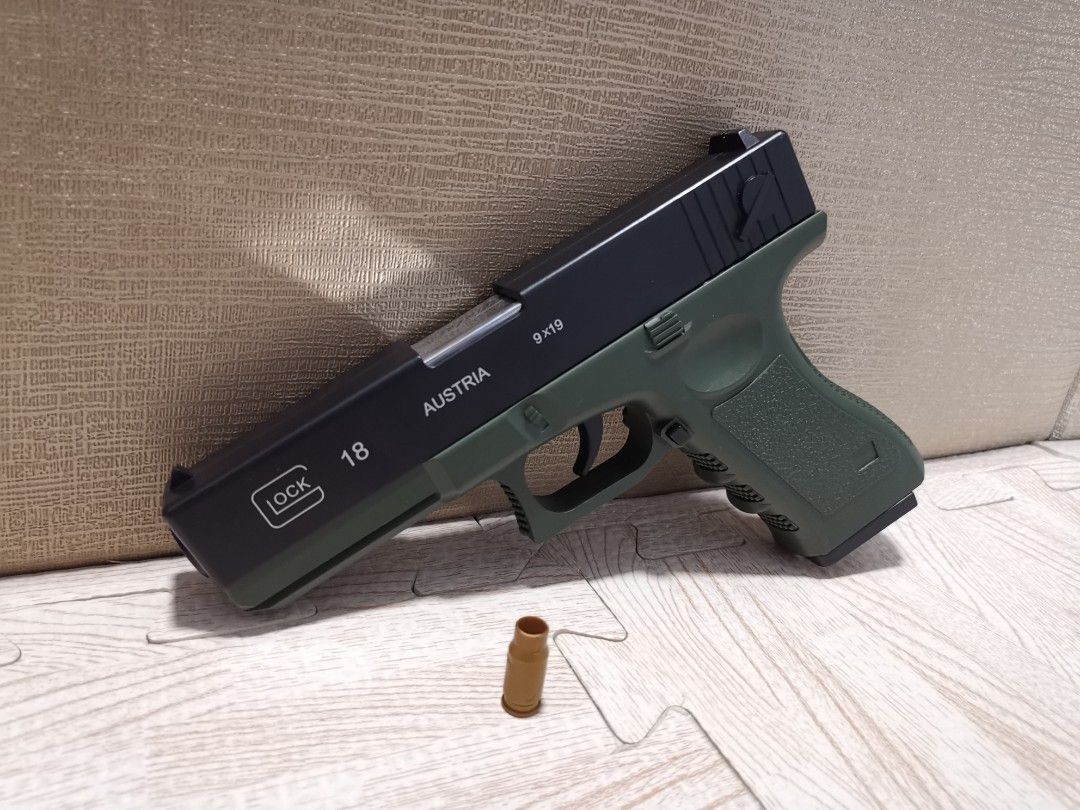 Not Nerf shell ejecting glock toy gun, Hobbies & Toys, Toys & Games on ...