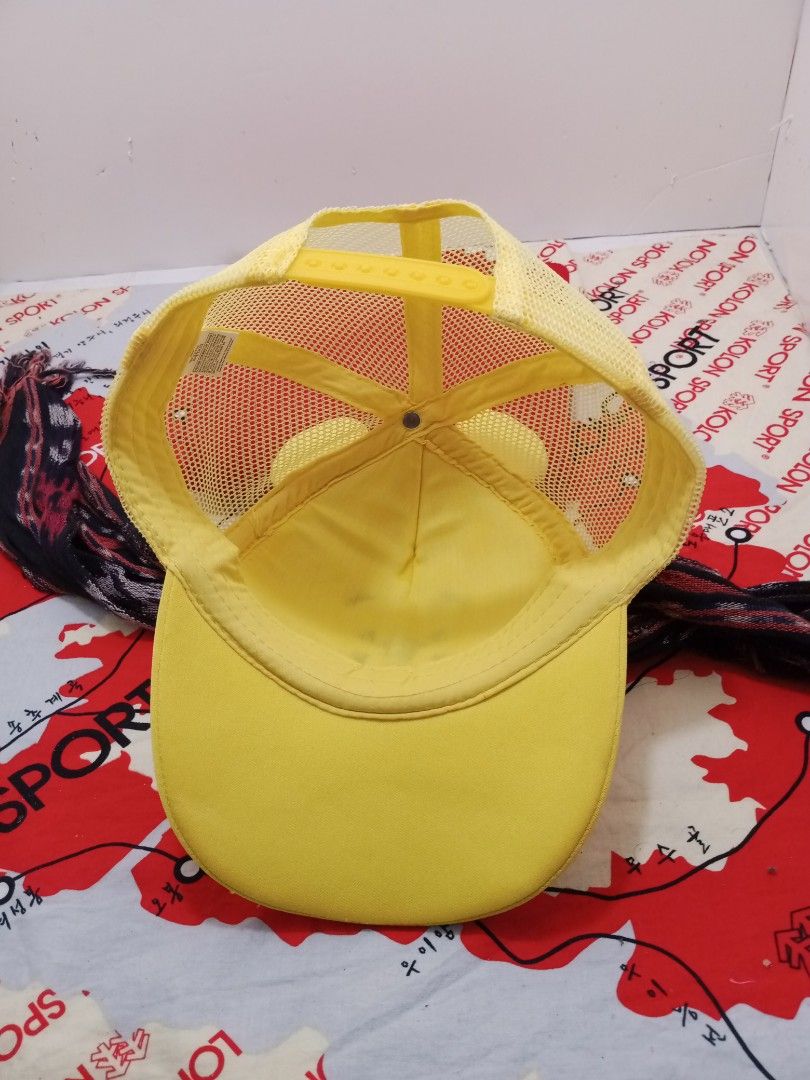 Topi DISNEY original karakter winnie the pooh kuning on Carousell