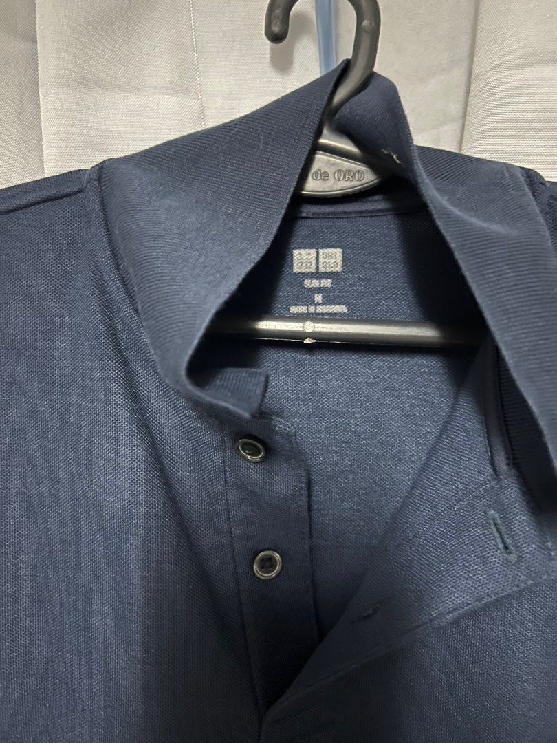 Uniqlo Navy Blue Polo Shirt, Men's Fashion, Tops & Sets, Tshirts & Polo Shirts on Carousell