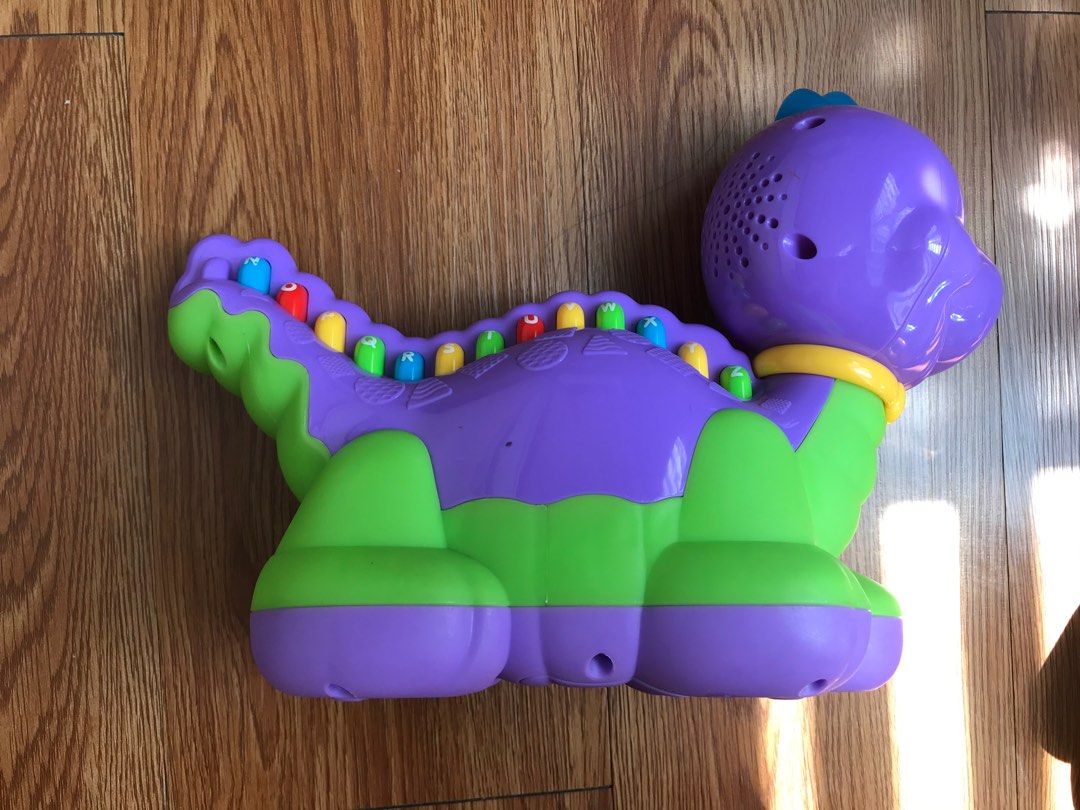 Leapfrog lettersaurus dinosaur, Babies & Kids, Infant Playtime on Carousell