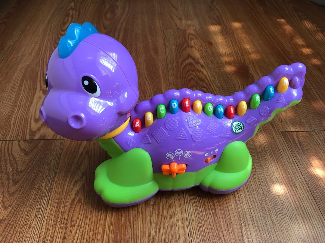 Leapfrog lettersaurus dinosaur, Babies & Kids, Infant Playtime on Carousell