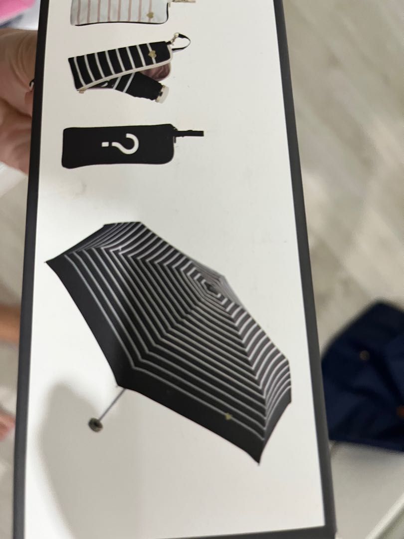 WPC light weight umbrella, Hobbies & Toys, Travel, Umbrellas on Carousell