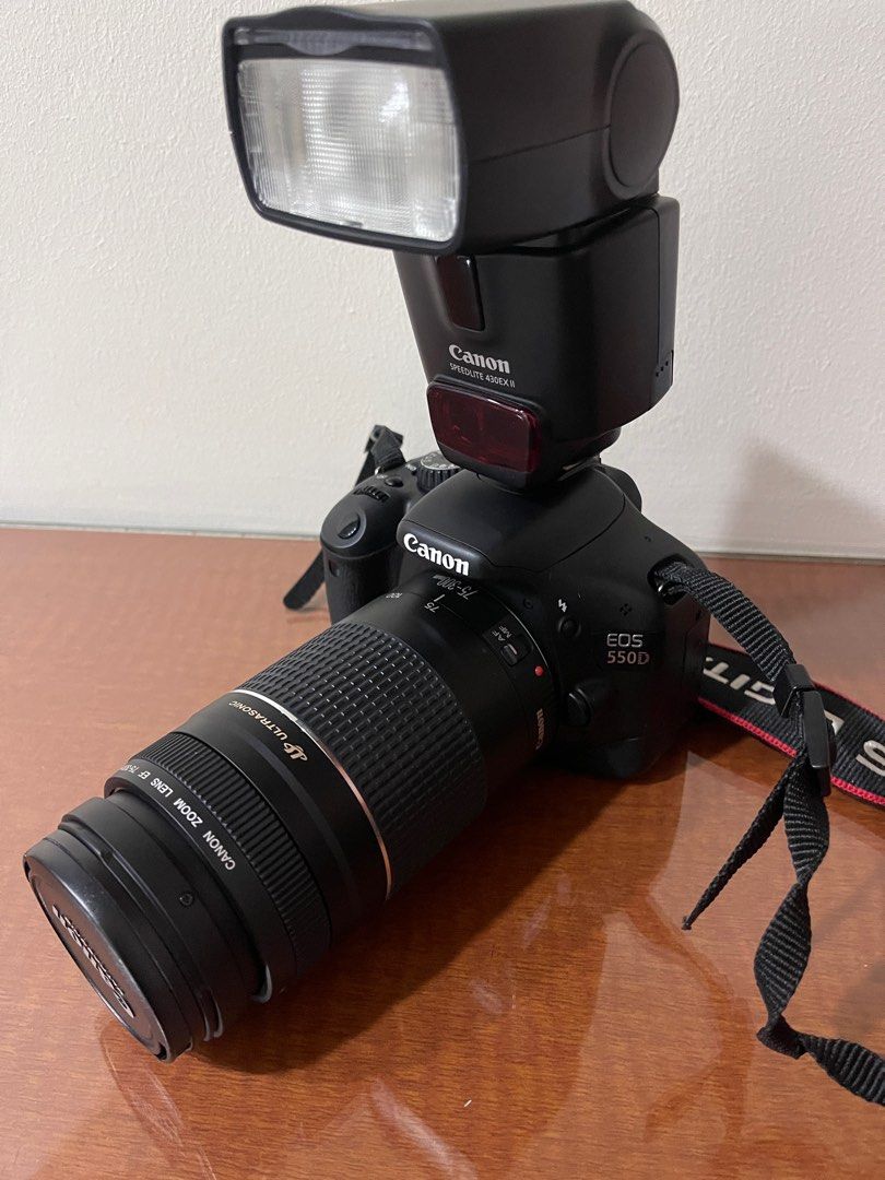 EOS 550D body plus free Zoom Lense (75-300mm f4-5.6) and feee Canon ...