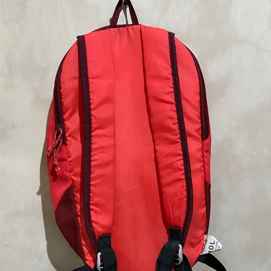 Quechua pink backpack on Carousell