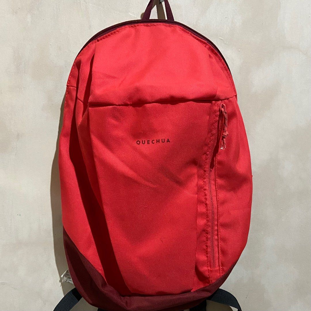 Quechua pink backpack on Carousell