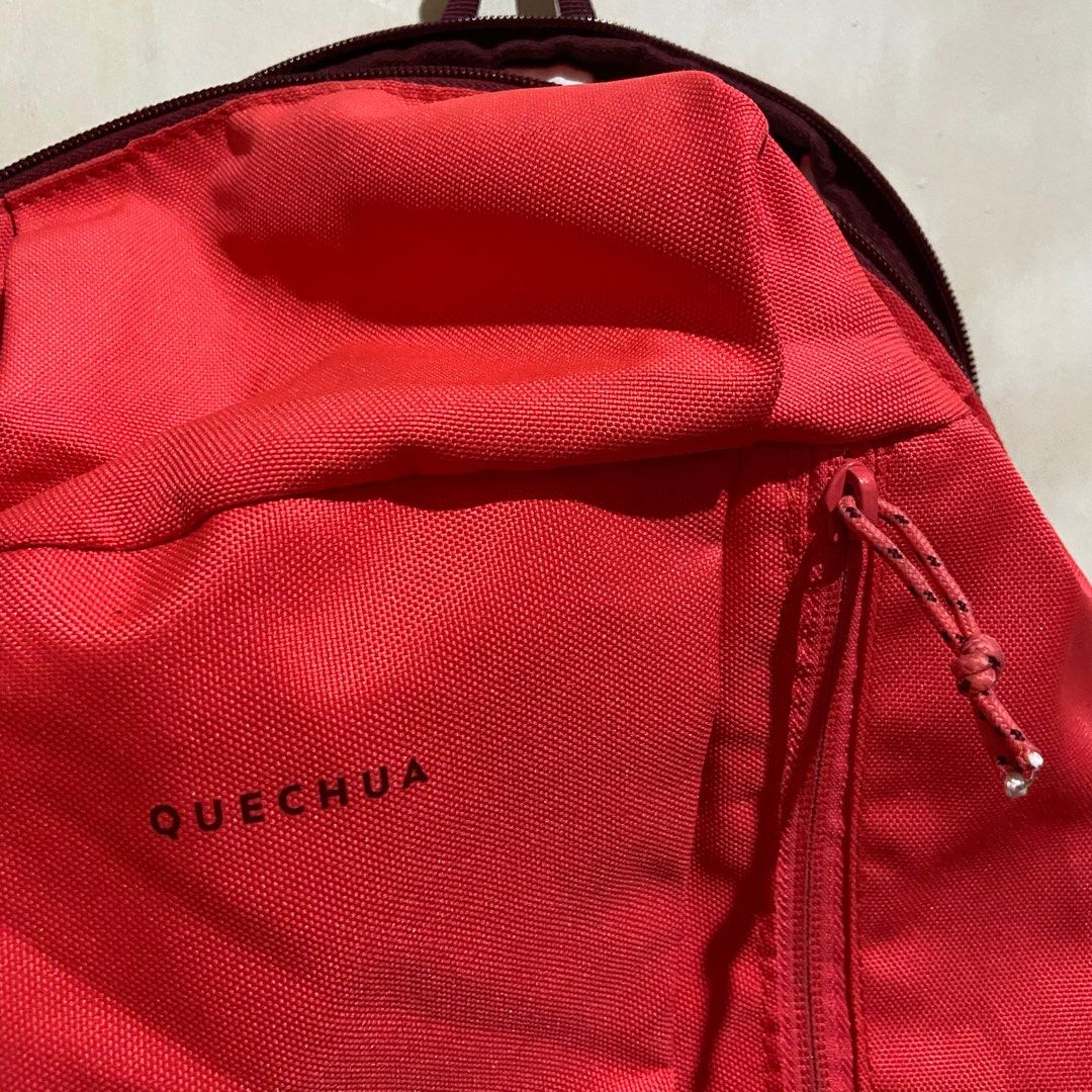 Quechua pink backpack on Carousell