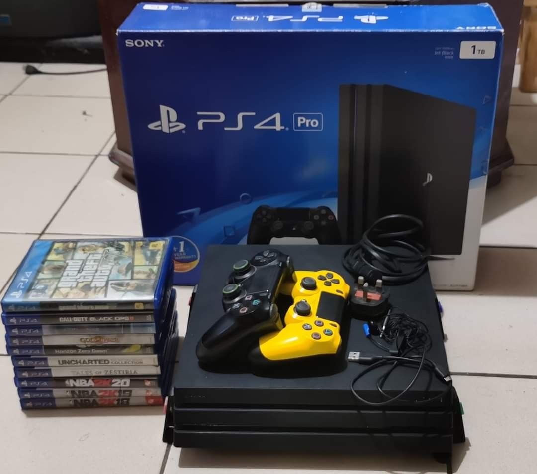 FOR SALE PS4 PRO with 10 Physical Games and 2 controllers power chord ...