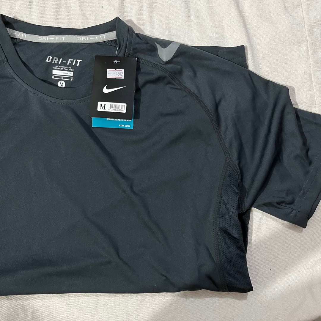 Nike dri-fit UPC top on Carousell