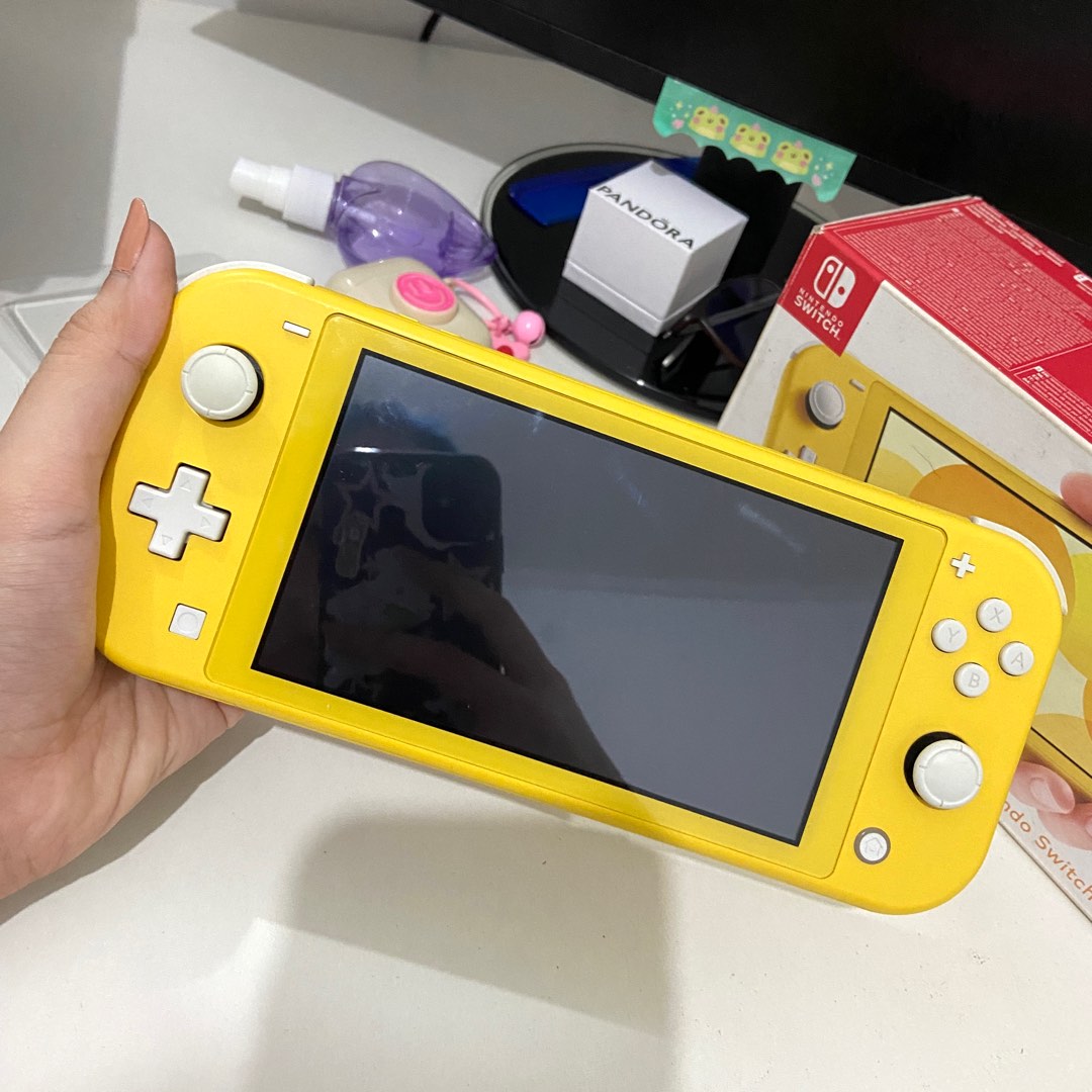 Nintendo Switch Lite Yellow, Video Gaming, Video Game Consoles ...