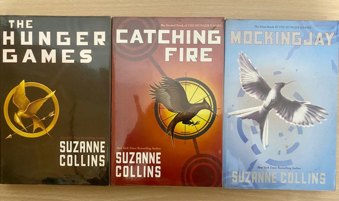 The Hunger Games Trilogy by Suzanne Collins, Hobbies & Toys, Books ...