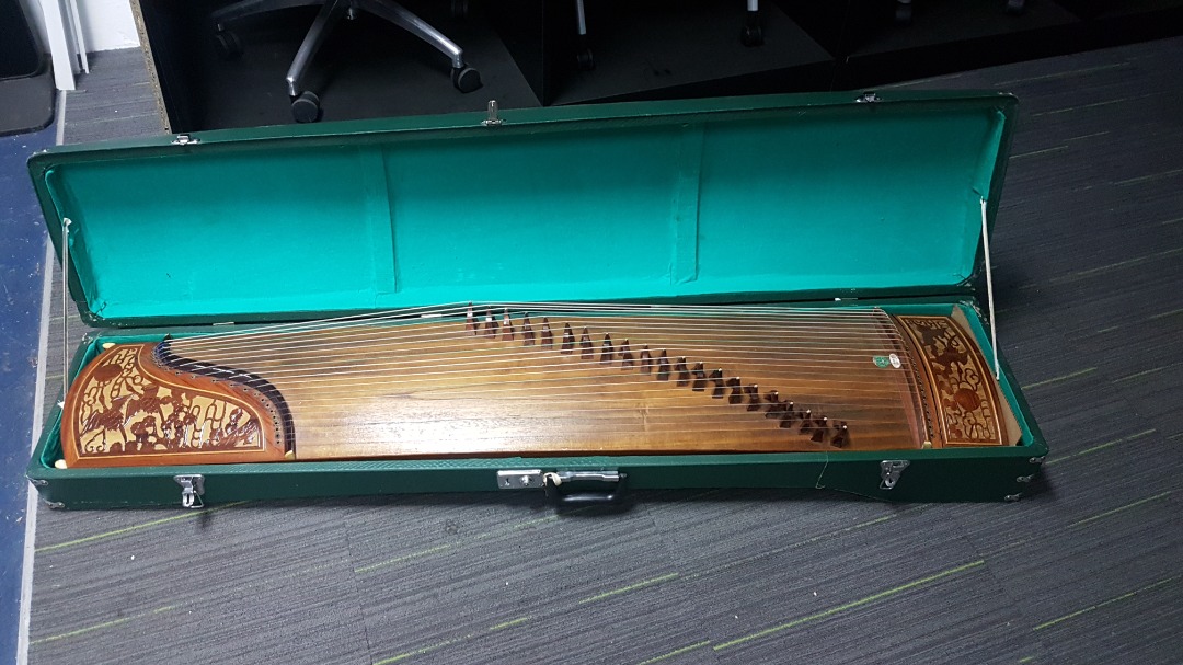Old Chinese musical instrument .. still good $300. Call, Hobbies & Toys ...