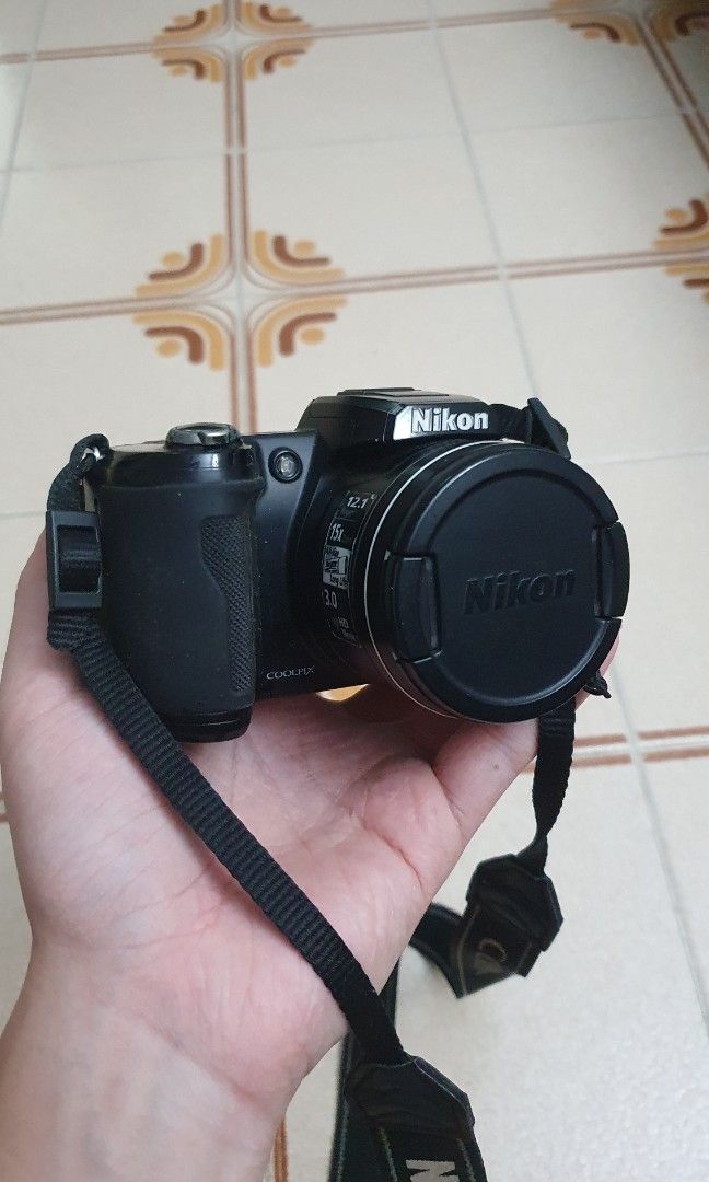 Spoilt Nikon Camera, Photography, Cameras on Carousell