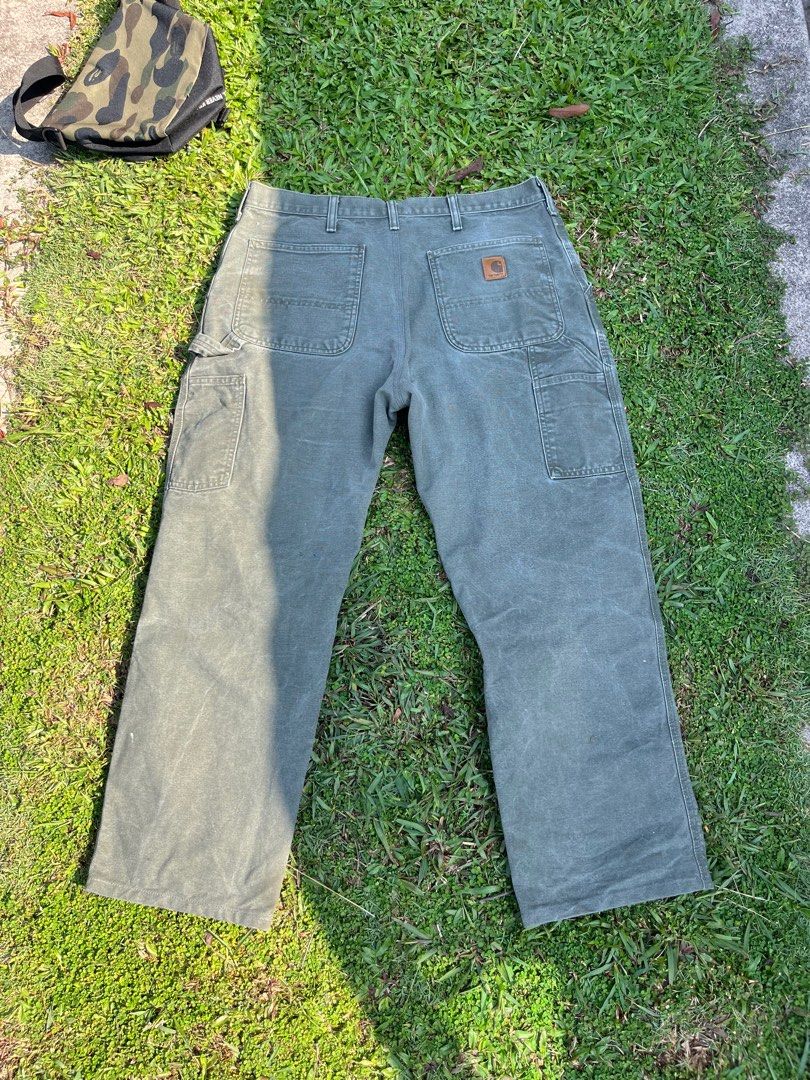 Carhatt Carpenter olive 33-34, Men's Fashion, Bottoms, Jeans on Carousell