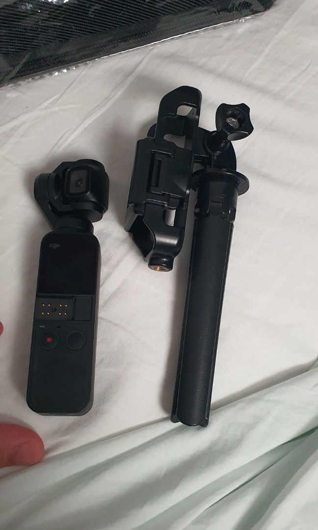 Dji omo pocket, Photography, Video Cameras on Carousell