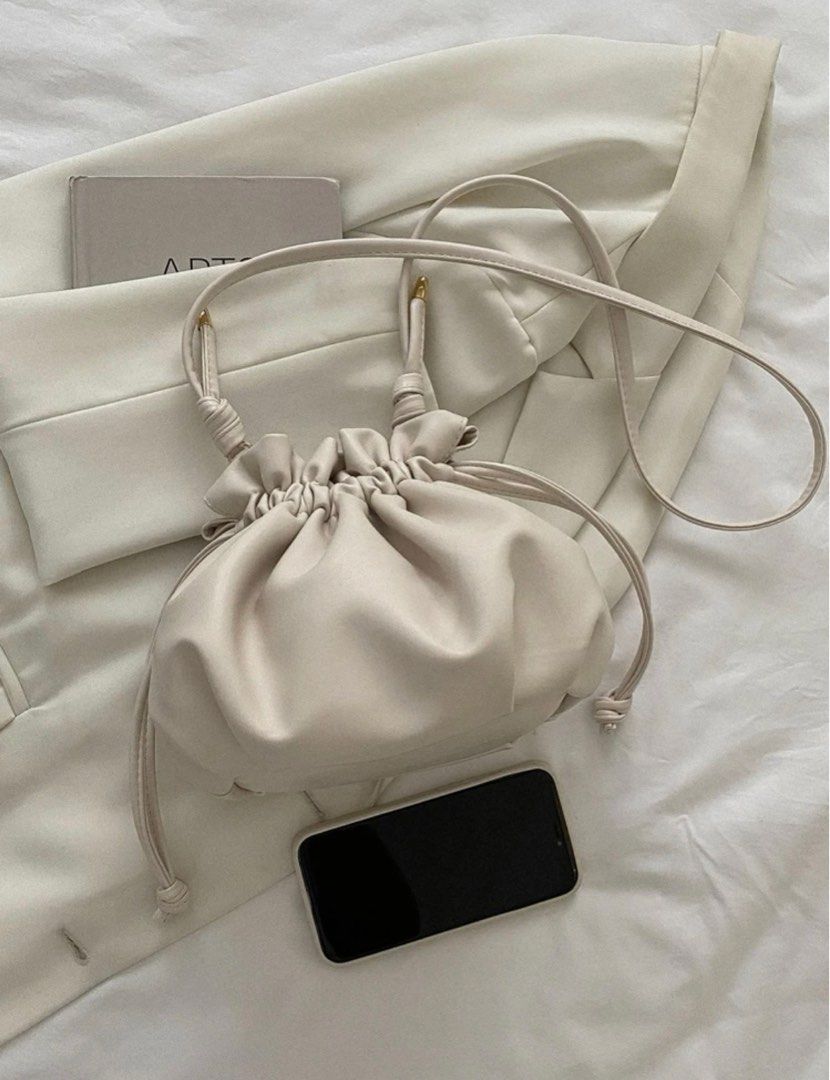 mini drawstring bucket bag in beige, Women's Fashion, Bags & Wallets ...