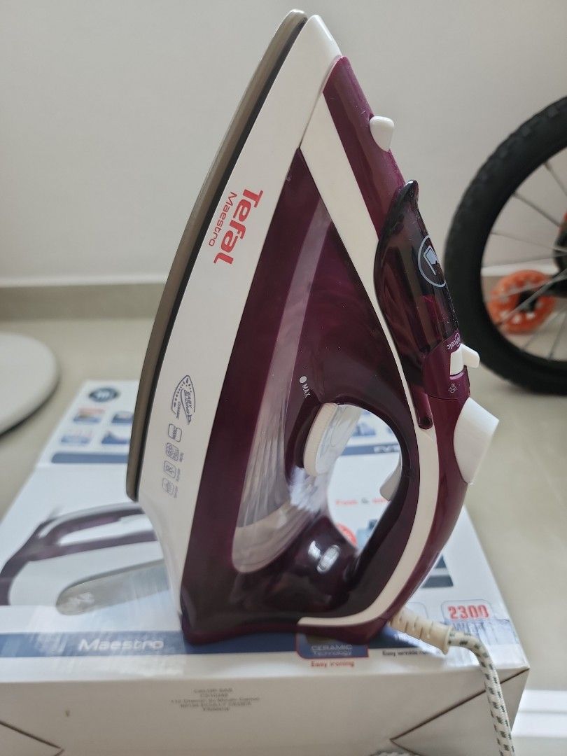Iron tefal. Purple($8) steam button spoil but still very new. The rest ...