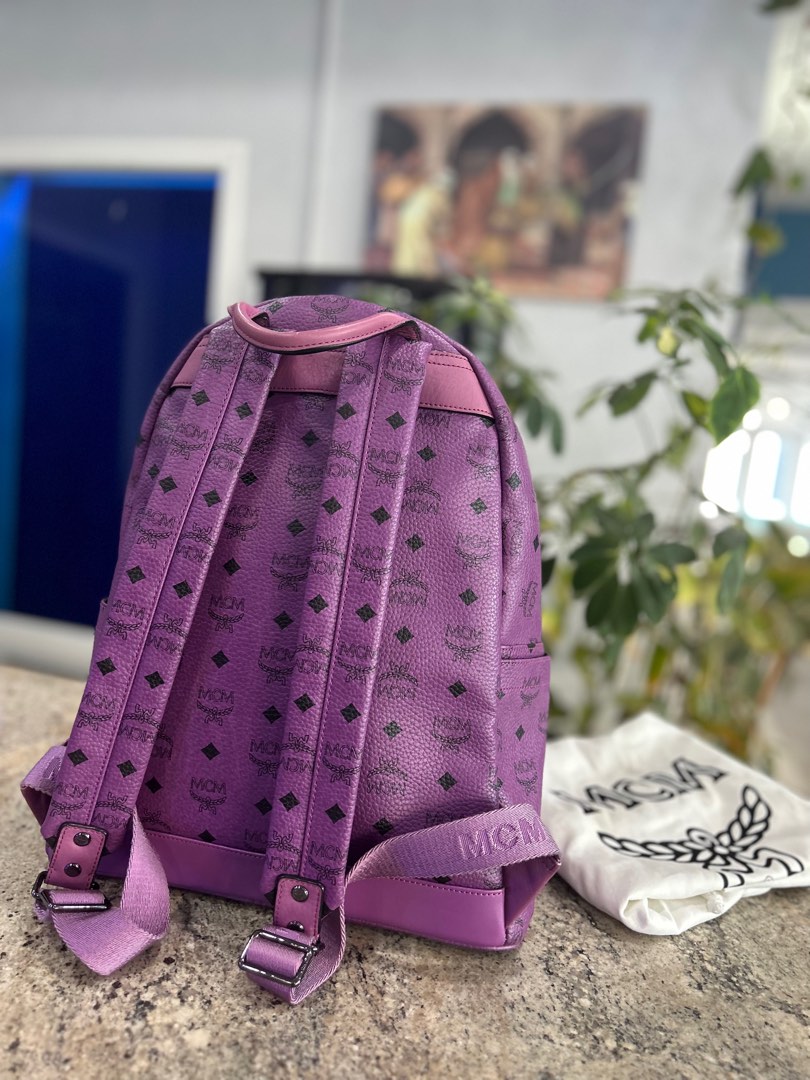 Mcm backpack in purple color, Luxury, Bags & Wallets on Carousell