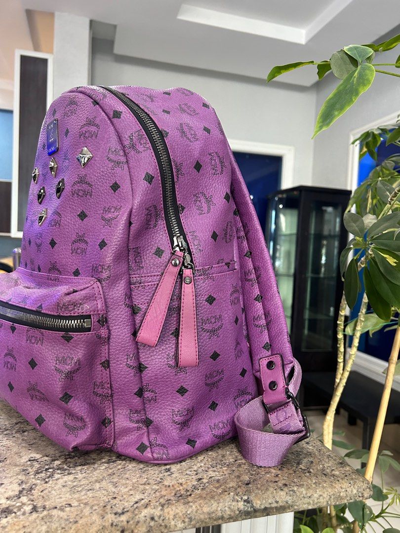 Mcm backpack in purple color, Luxury, Bags & Wallets on Carousell