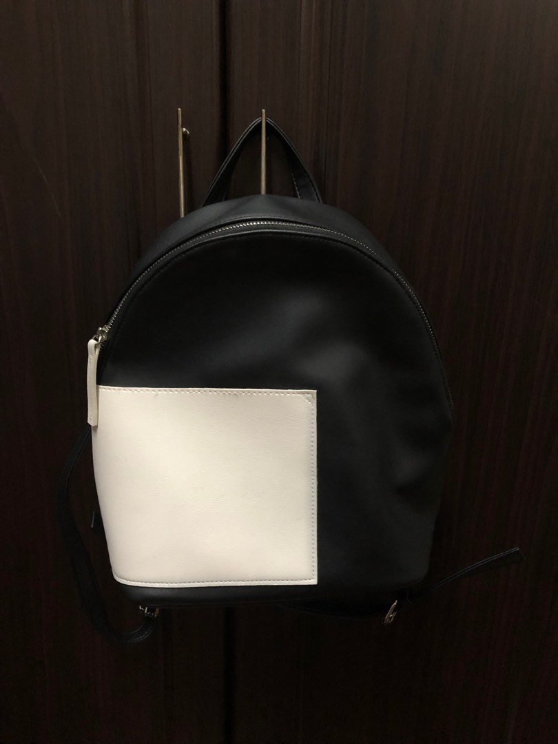 Miniso black mini backpack on Carousell