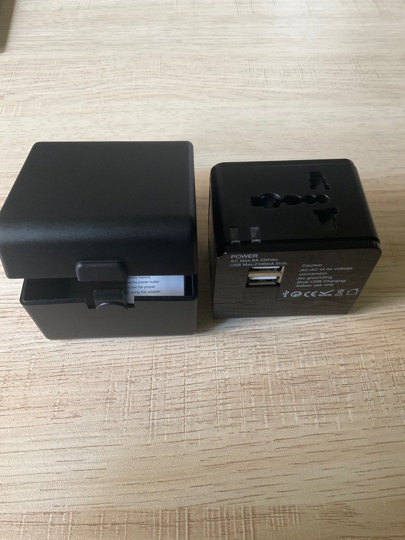 Travel adapter SingTel black, TV & Home Appliances, Electrical ...