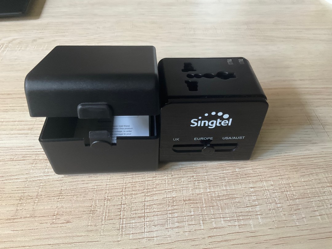 Travel adapter SingTel black, TV & Home Appliances, Electrical ...