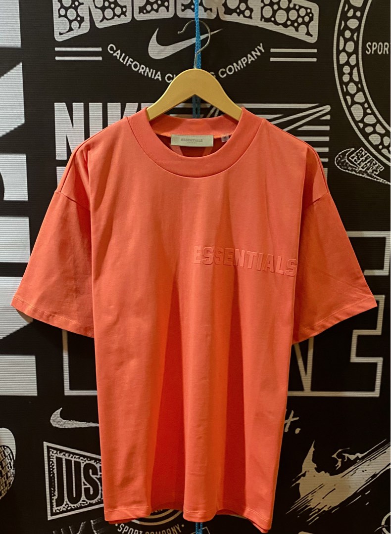 ESSENTIALS SIDE LOGO SCRIPT (coral) T-SHIRT on Carousell